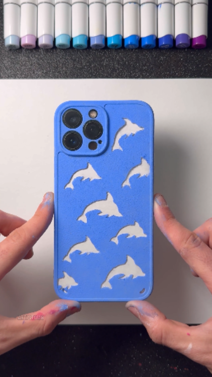 Blue phone case with swimming silhouettes