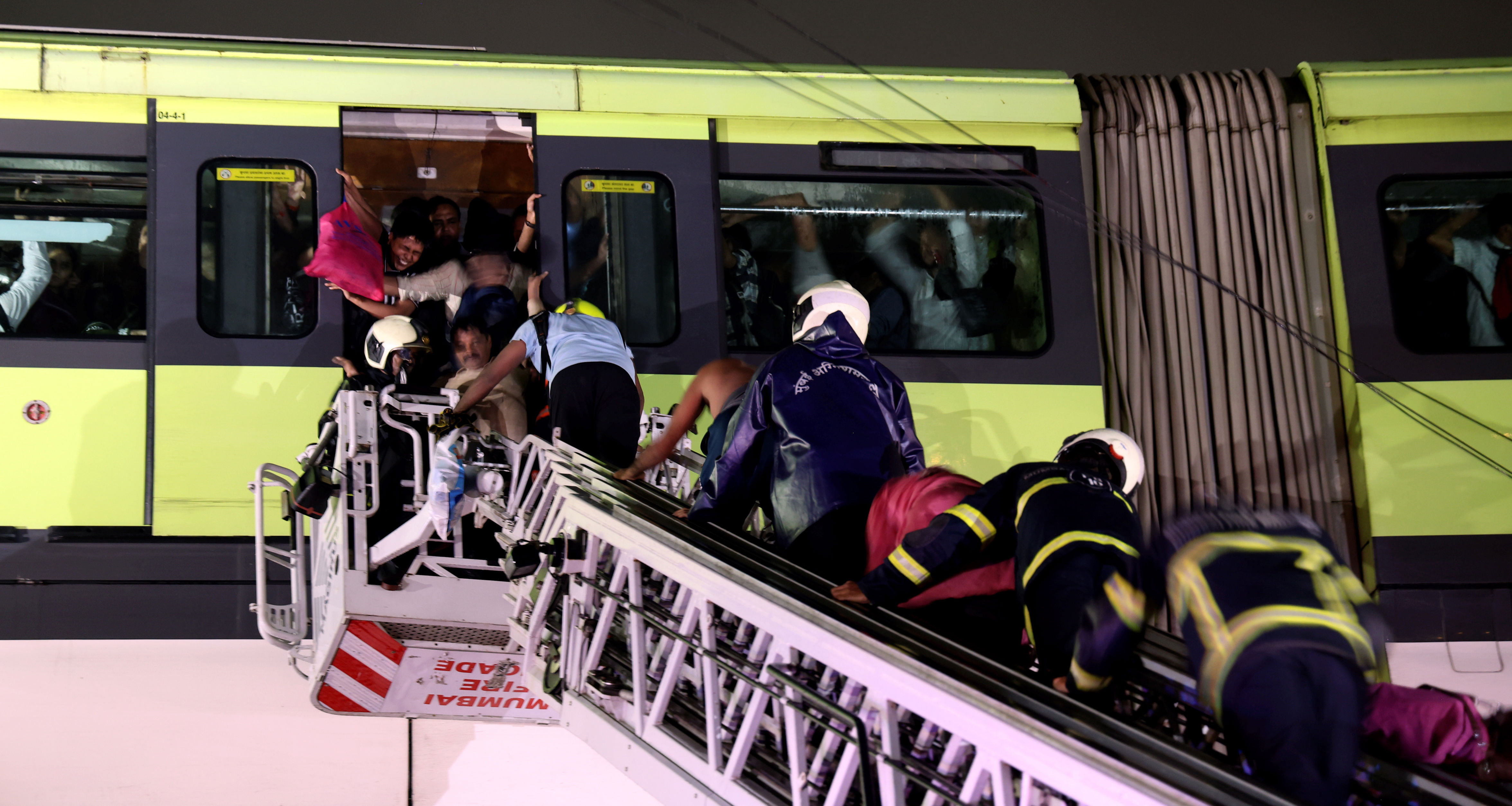 Gripped with fear and panic, some commuters mulled jumping off stranded ...