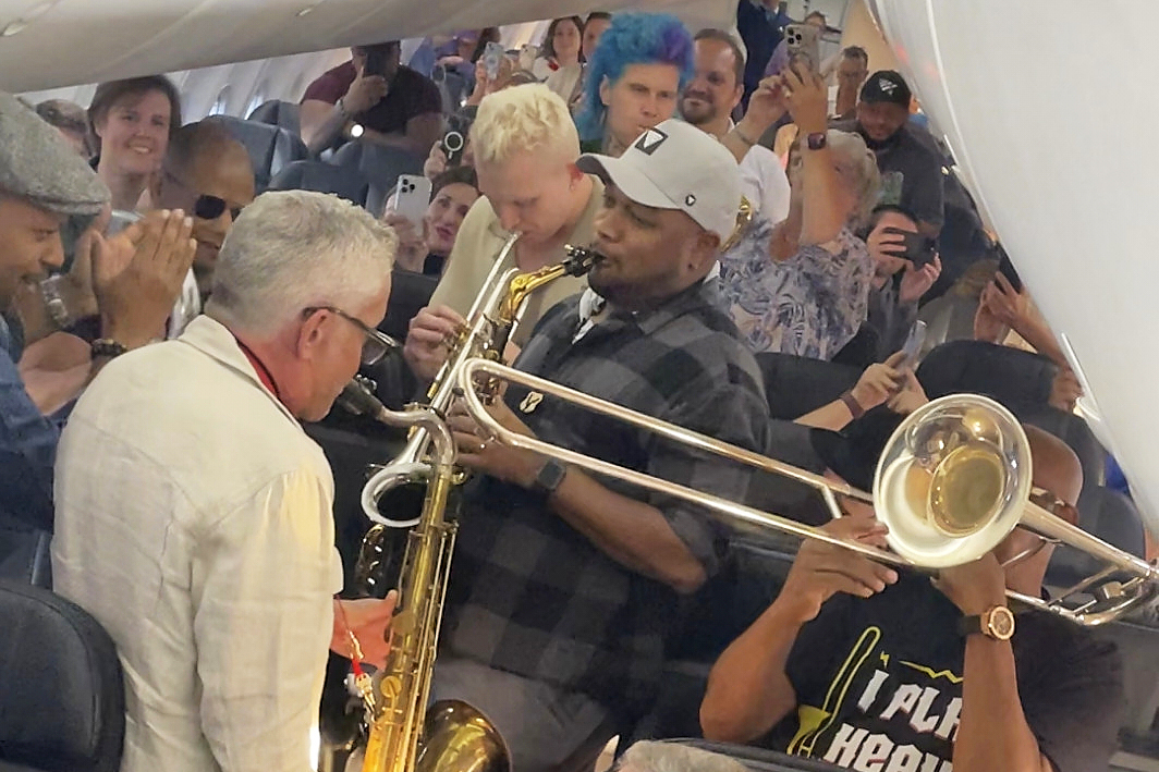 Jazz band turns flight delay into viral moment