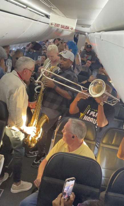 Jazz band turns flight delay into viral moment