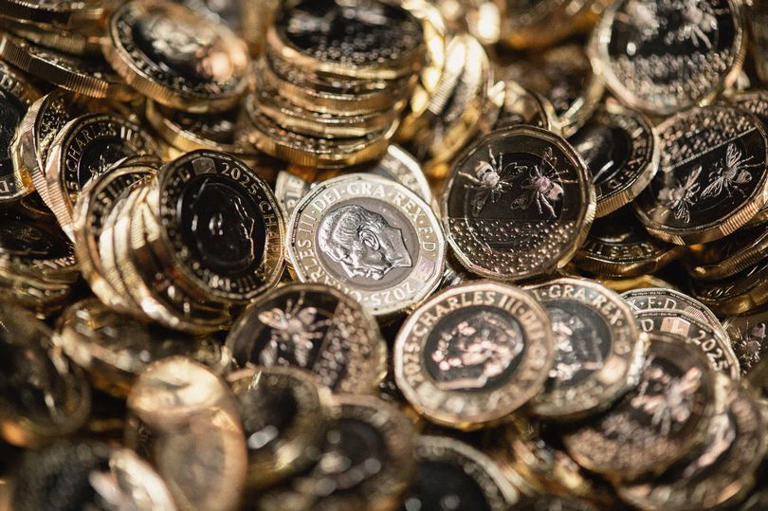 Brits urged to check change as 'rarest' £1 coins released