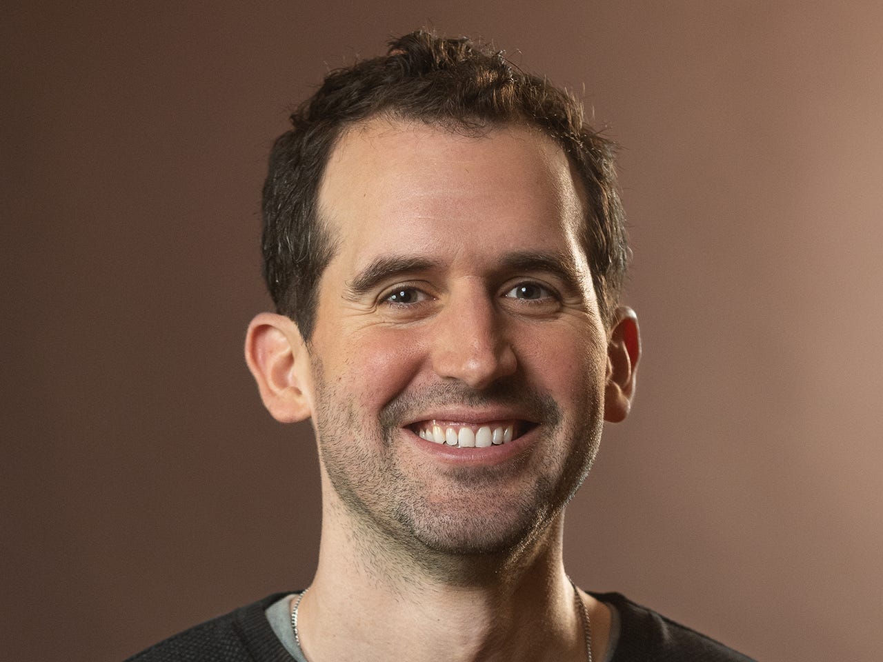 Anthropic cofounder Tom Brown networked and self-studied his way into ...