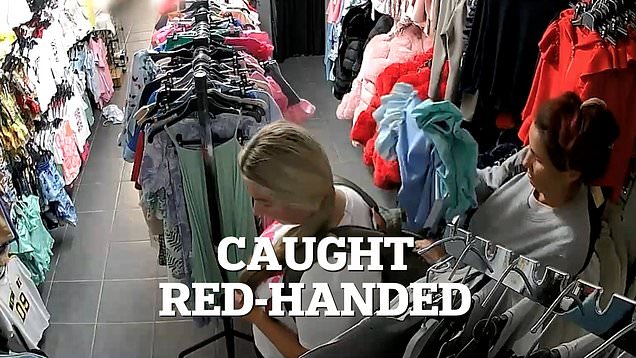 Caught red-handed! Moment shoplifters steal £100 worth of clothes