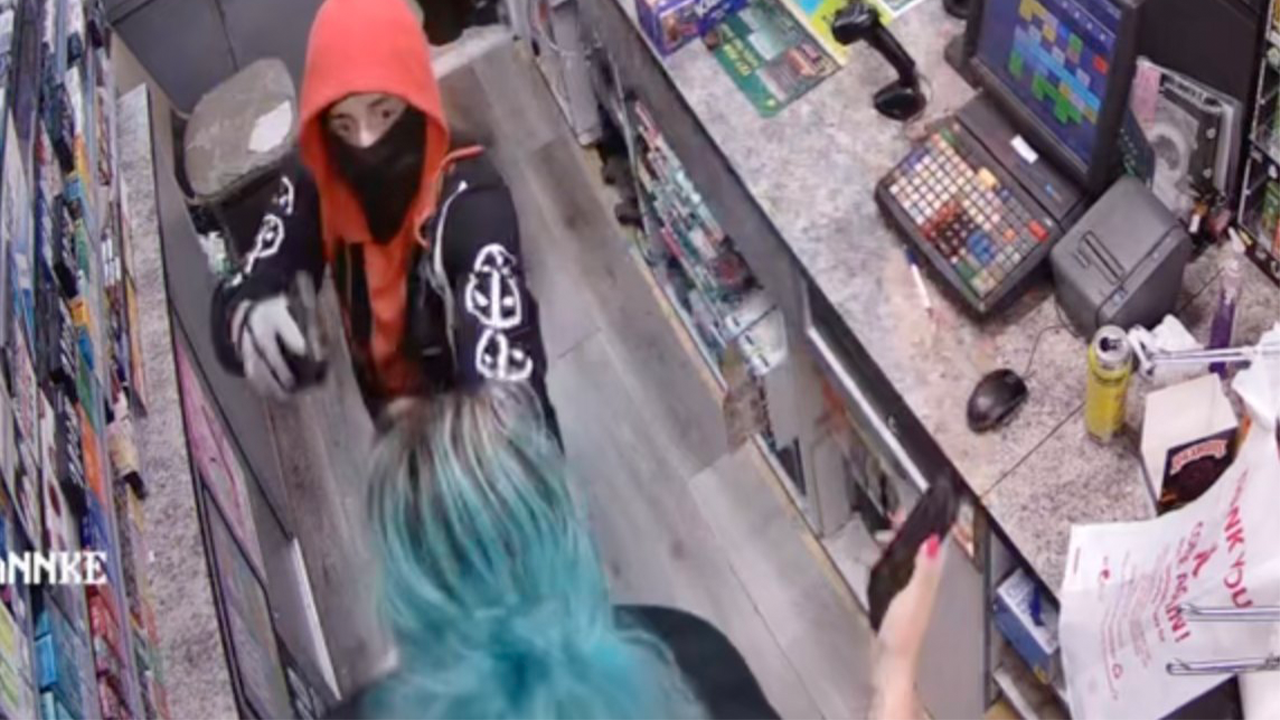 Disturbing photos show Ramsey County robber pointing gun at clerk's head