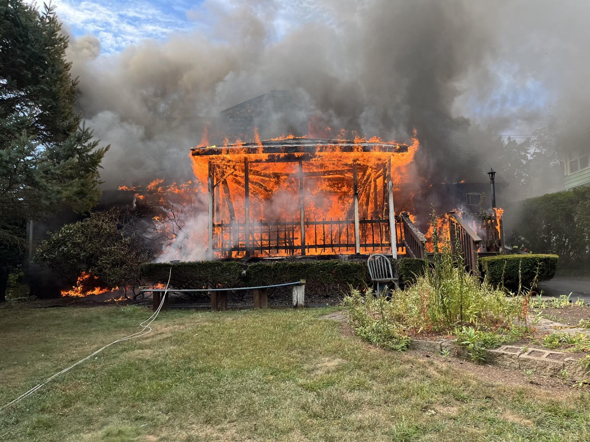 1 person hospitalized after house fire in Meriden