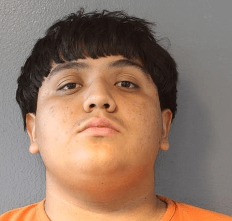 One in custody after teen hit, injured by pickup truck