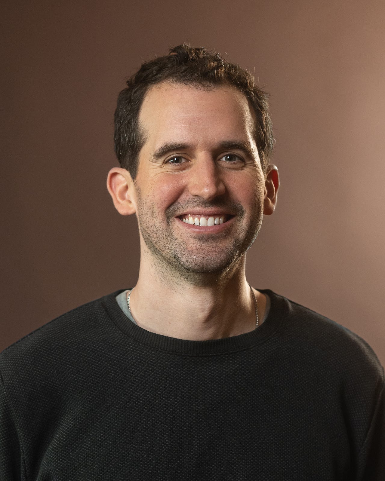 Anthropic cofounder Tom Brown networked and self-studied his way into ...