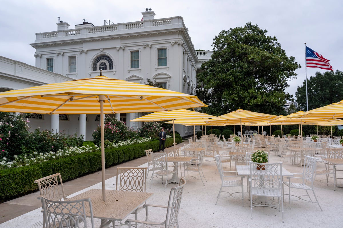 Trump blares ‘Whiter Shade of Pale’ and shows off umbrellas flown from ...