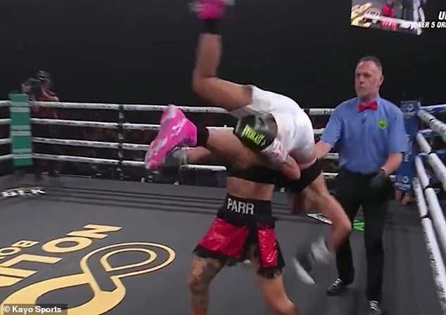 See the moment the daughter of an Aussie sporting legend FLIPS boxer ...