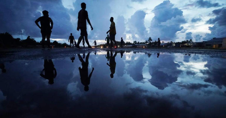 Climate Change Is Sinking a Small Pacific Island, Leaving Its People ...