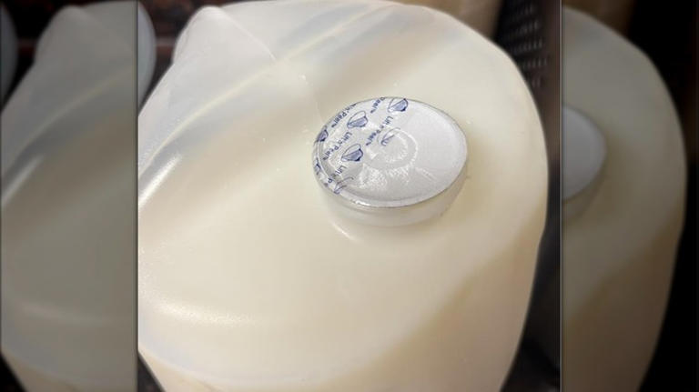 You're Not Alone If You Think Costco's Milk Is Ridiculously Hard To Open