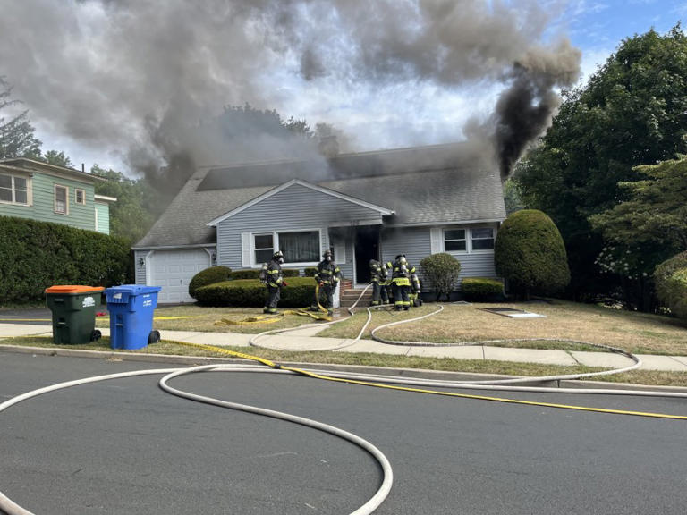 Bystanders rescue resident from house fire in Meriden