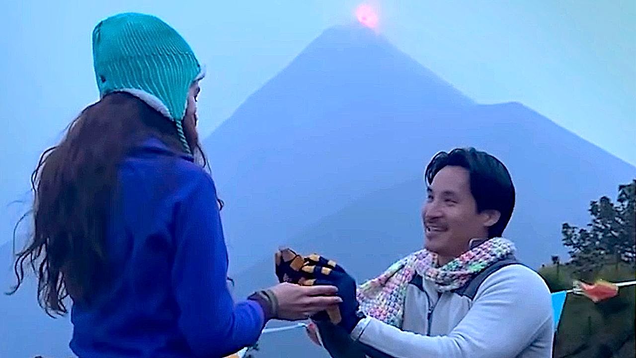 Amazing moment volcano explodes during romantic proposal