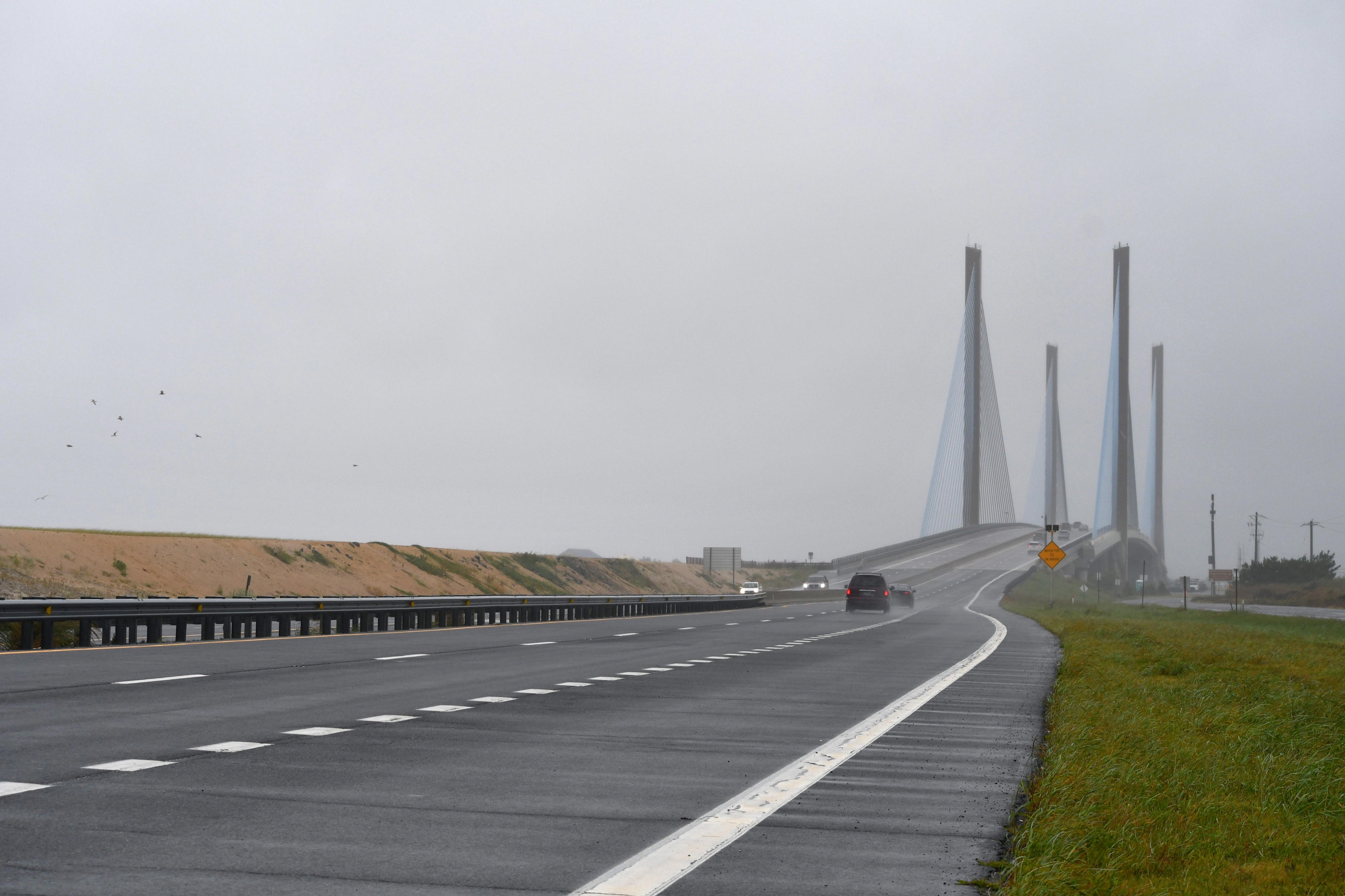 Hurricane Erin's high tide closes Coastal Highway at the Indian River Inlet