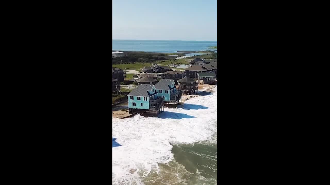 Wild video shows tidal surge swallowing homes as Hurricane Erin slams ...