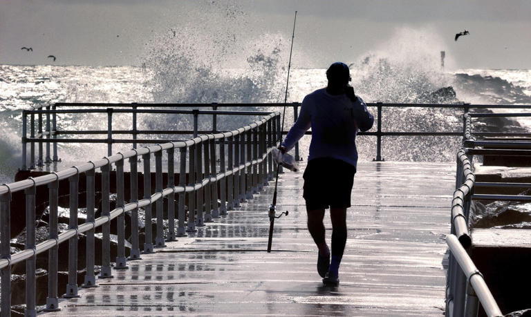 Hurricane Erin stirs up strong winds and floods part of a NC highway as ...