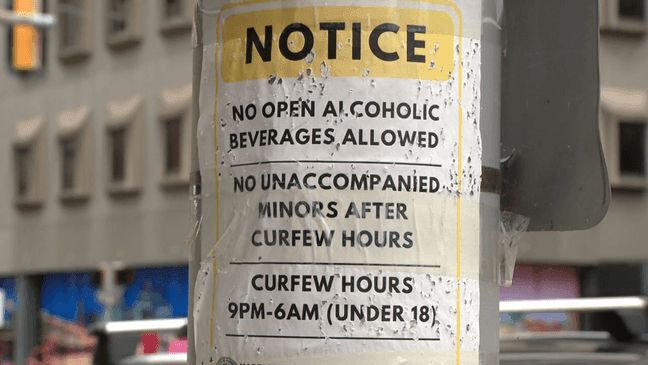 Curfew signs put up by Harrisburg business owner now taken down