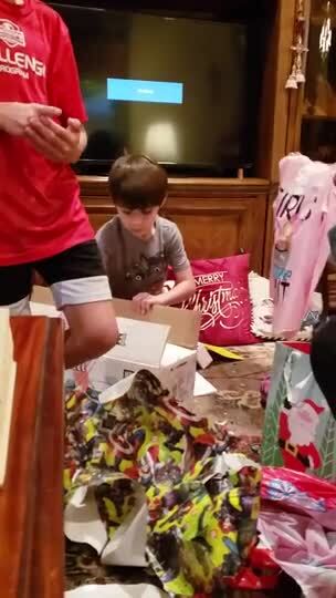 Kid Looks Disappointed When He Unwraps Gift and Finds Box Empty