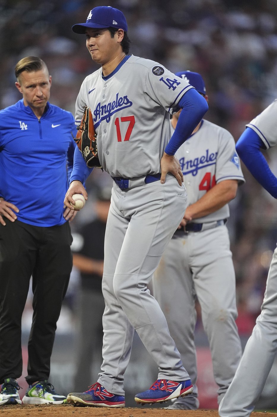 Dodgers' Ohtani roughed up by Rockies, leaves game after getting hit on ...