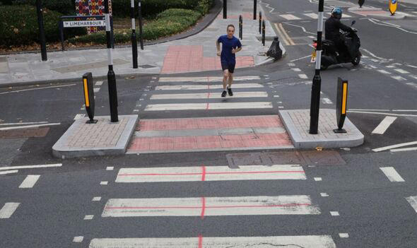 Defiant English neighbourhood covers zebra crossings in St George's cross