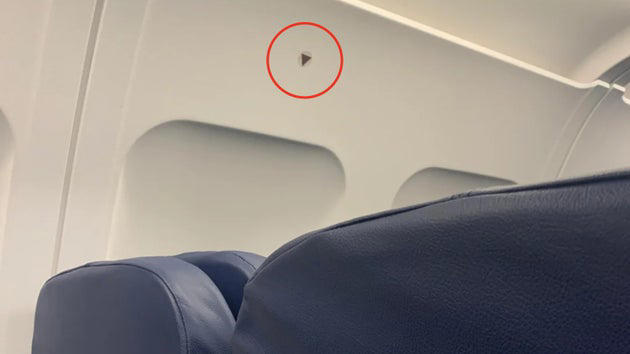 People are learning why there's a tiny black triangle above plane windows