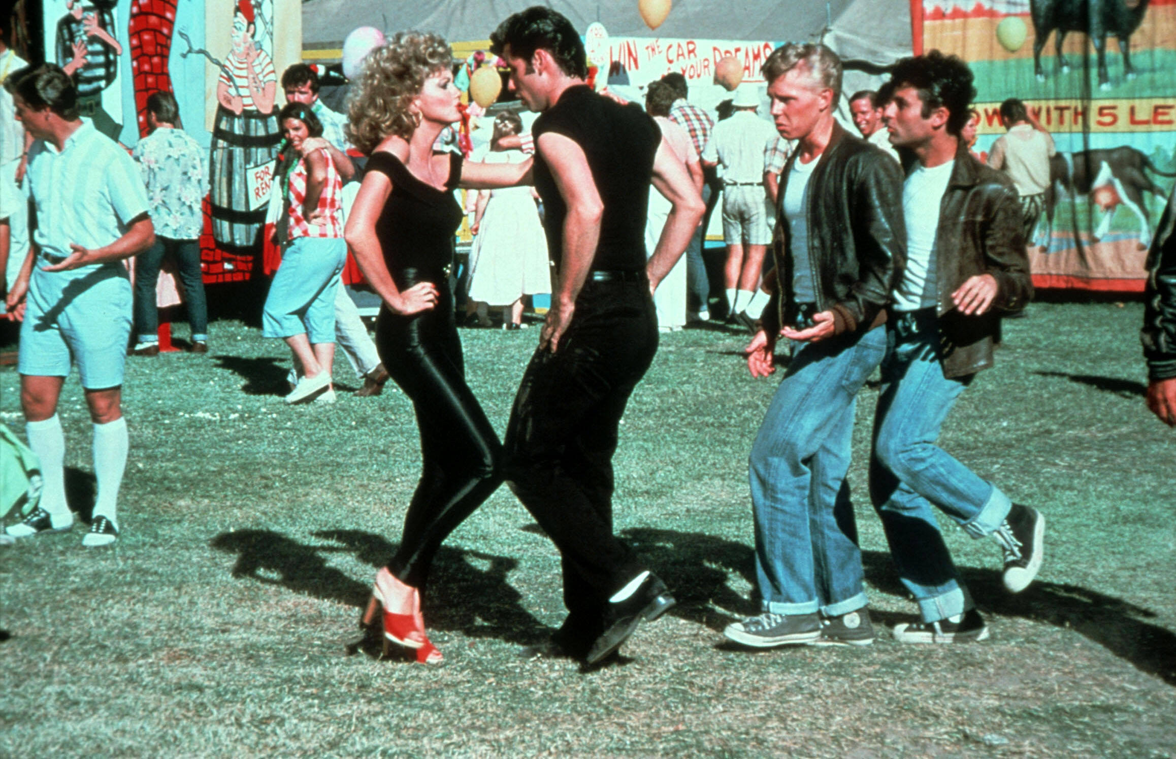 How Old Were The Stars Of 'Grease' Compared To Their Characters?