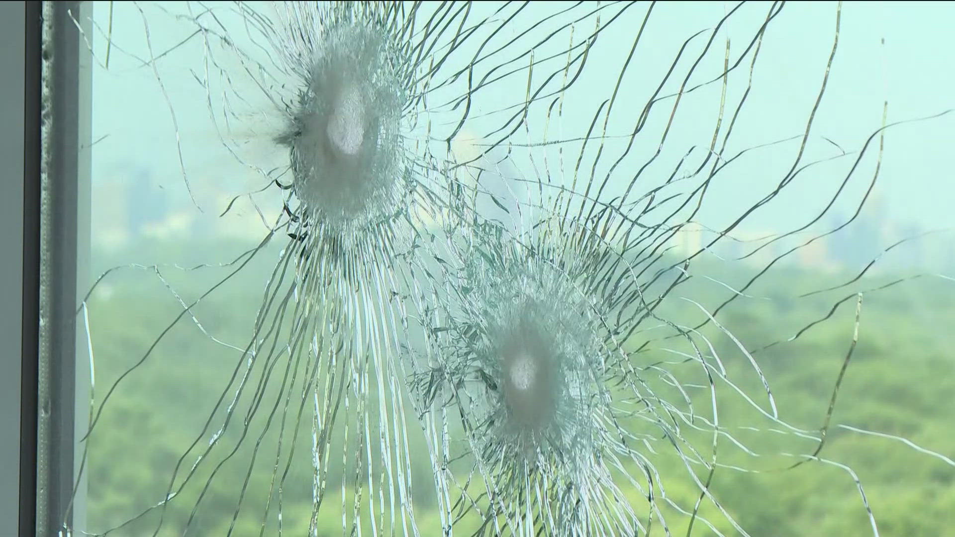 CDC damage tour shows windows with bullet holes, cracks following ...