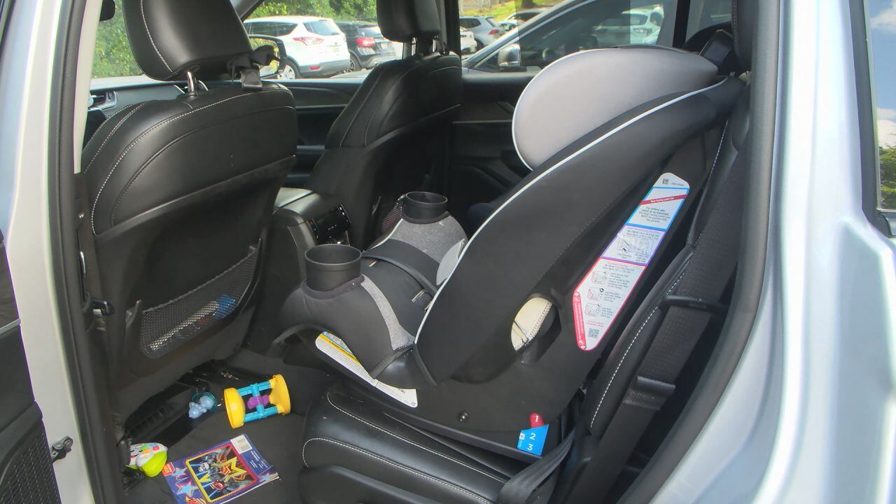 Police break car window to rescue baby in The Legends parking lot