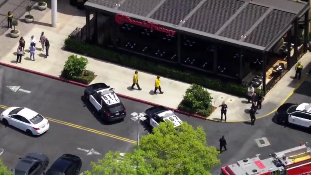 Woman hospitalized, suspect in custody after shooting outside Westfield ...