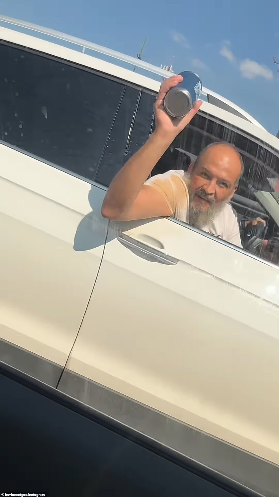 Road-rage passenger hit by instant karma while trying to hurl coffee