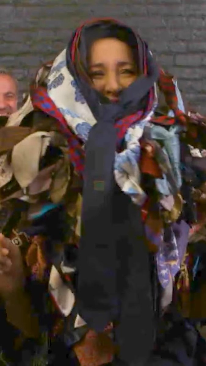 Watch: Canadian politician puts on 330 neck ties to break world record