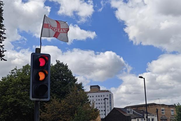 Group calls for 'intimidating' flags to be removed from lampposts and ...