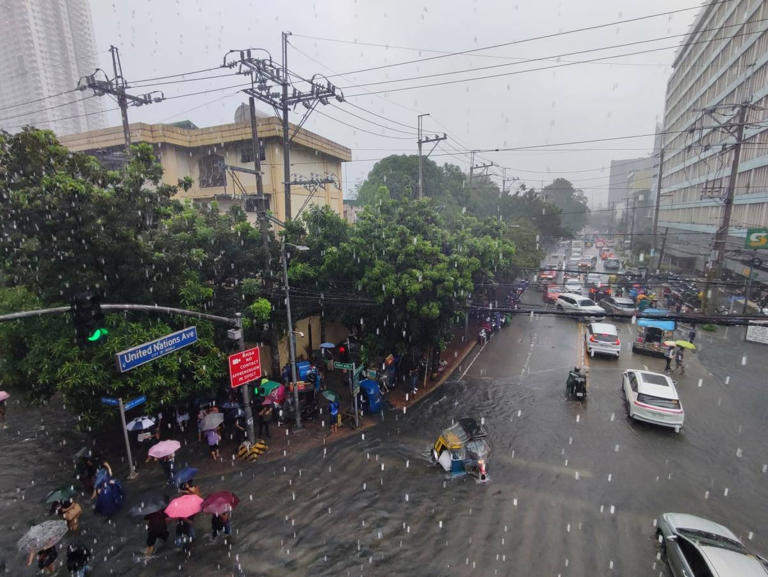 Flash floods hit Metro Manila, stranding commuters, causing heavy traffic