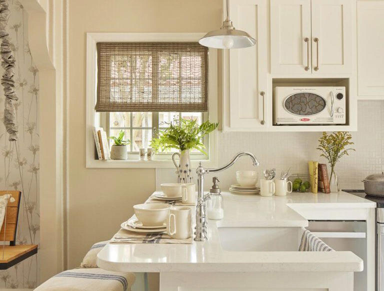8 Paint Colors Designers Use To Make A Small Kitchen Feel Bigger