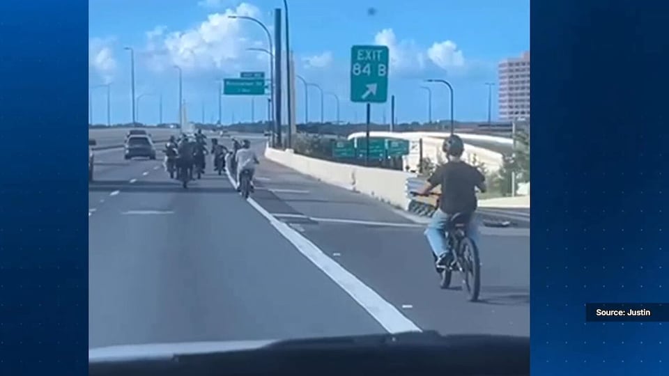 Video shows group of e-bike riders slowing traffic on busy stretch of I ...