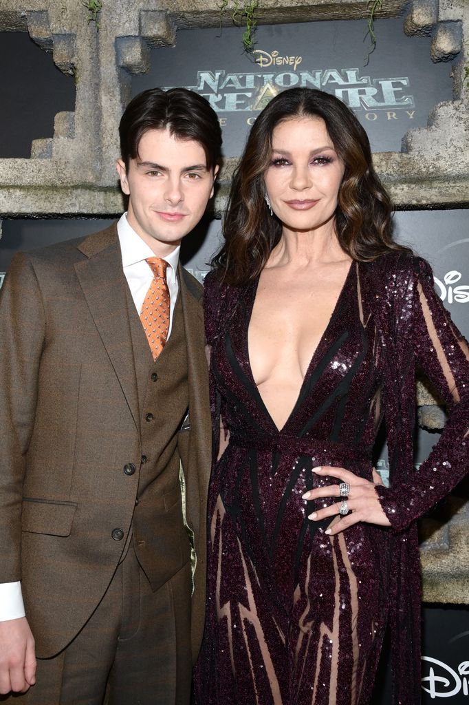 Michael Douglas' son Dylan towers over famous dad as they celebrate big ...