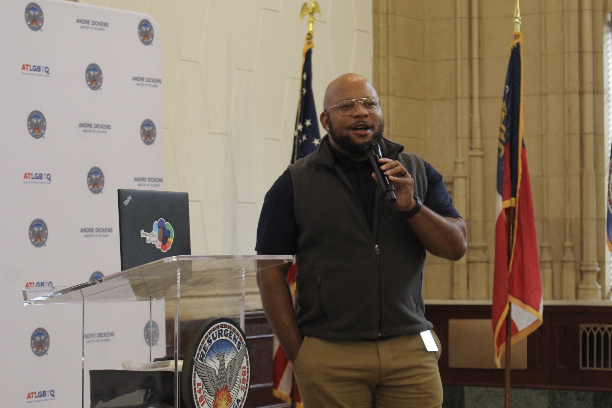 LGBTQ+ community voice health, financial, and civic concerns at town hall