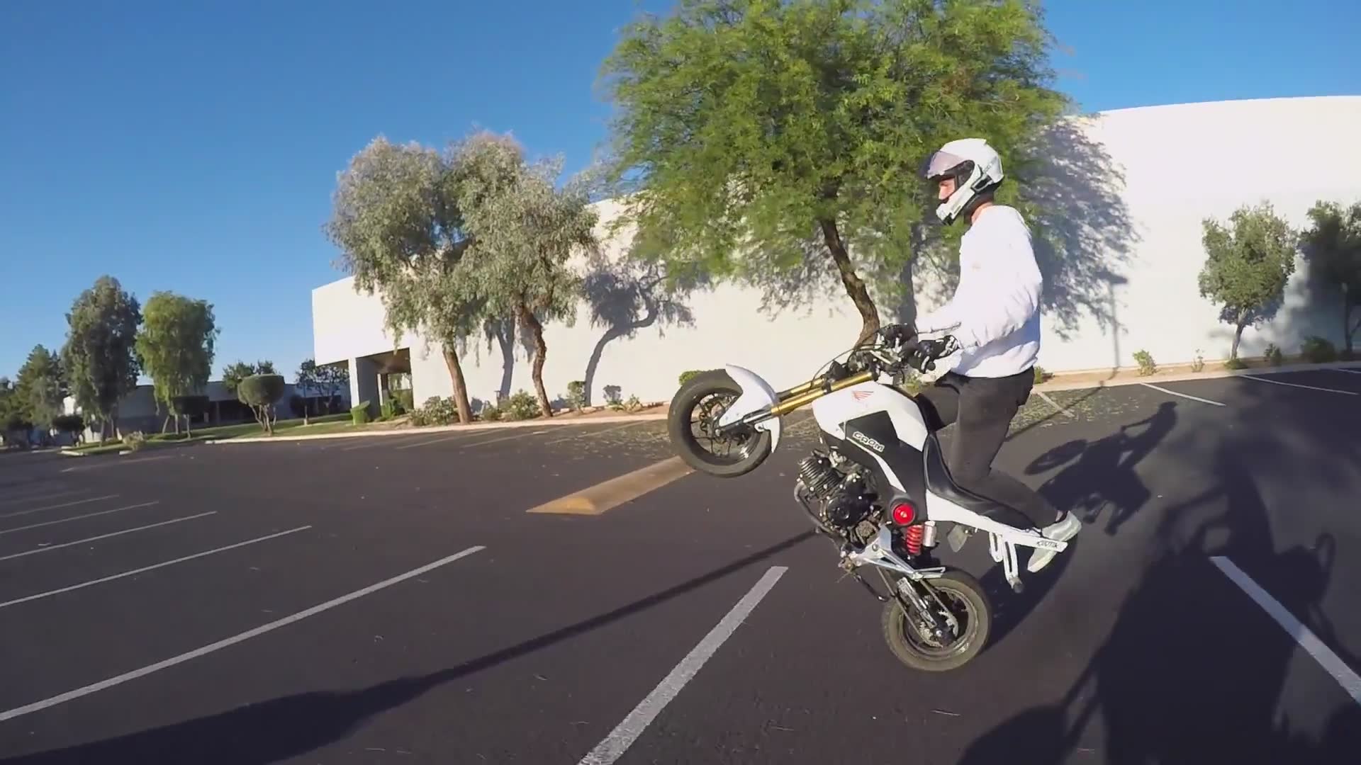 How to wheelie standing up