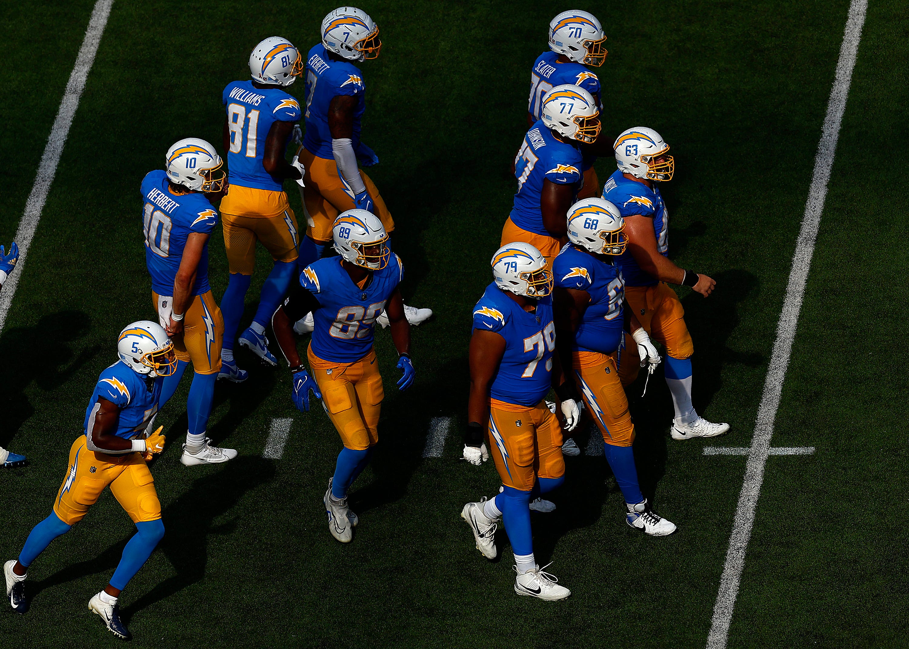 Jim Harbaugh outlines plans at tackle position amid Rashawn Slater's ...