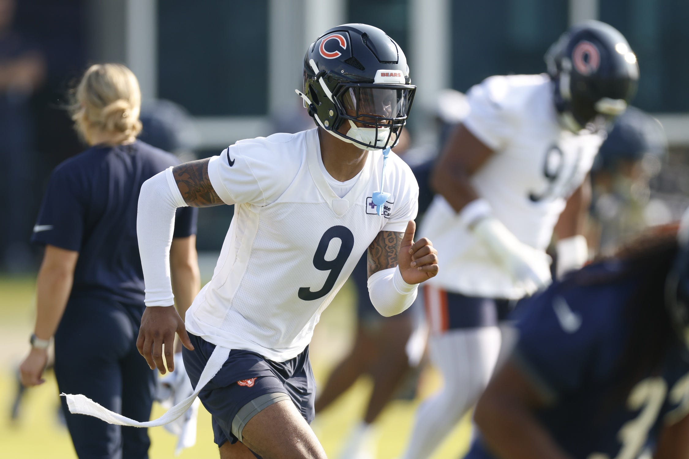 Bears safety Jaquan Brisker left practice early with trainer