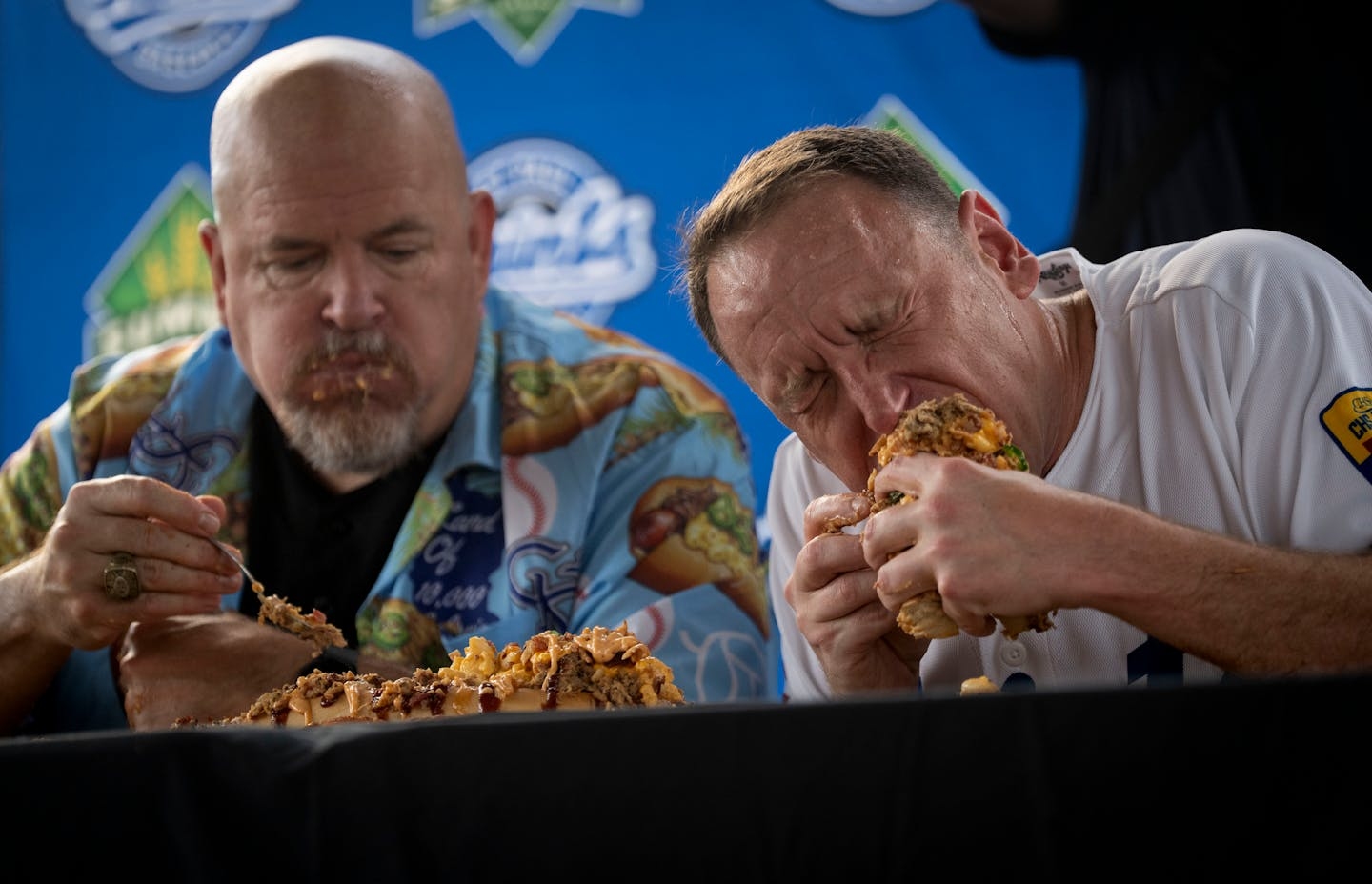 Eating champ Joey Chestnut and the Notorious B.O.B. consume ‘Land of ...