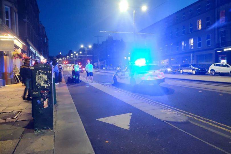 Edinburgh police race to Leith Walk incident after woman seen 'lying on ...