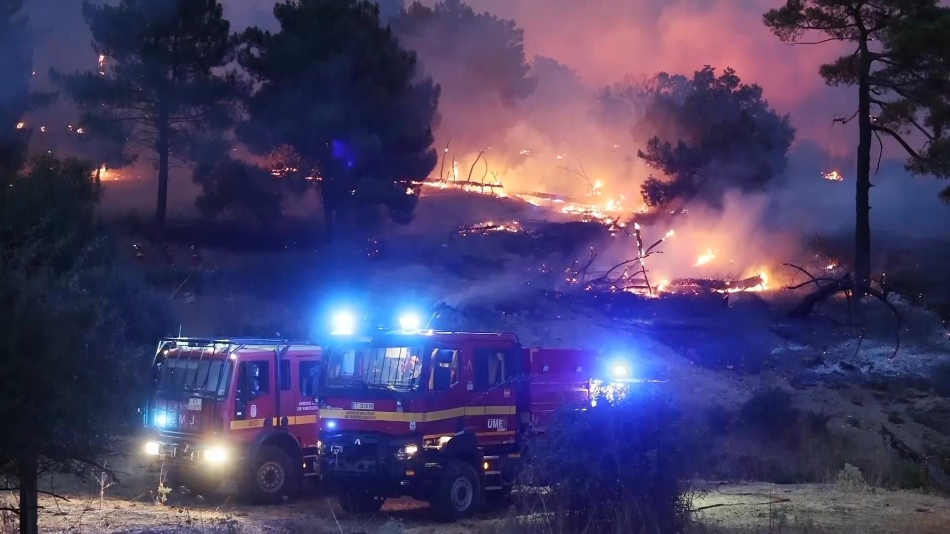 Firefighters battle wildfires in Spanish countryside as temperatures climb