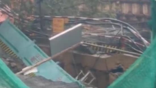Road near Delhi flyover collapses after metro wall falls during heavy ...