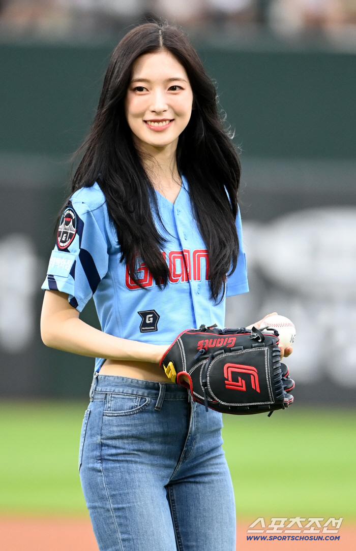 Arin, with her innocent smile on the mound
