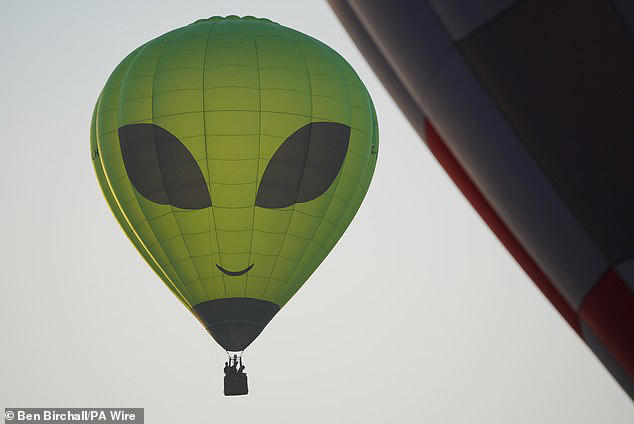 Up, up and away! Skies above Bristol fill with dinosaurs, aliens and ...