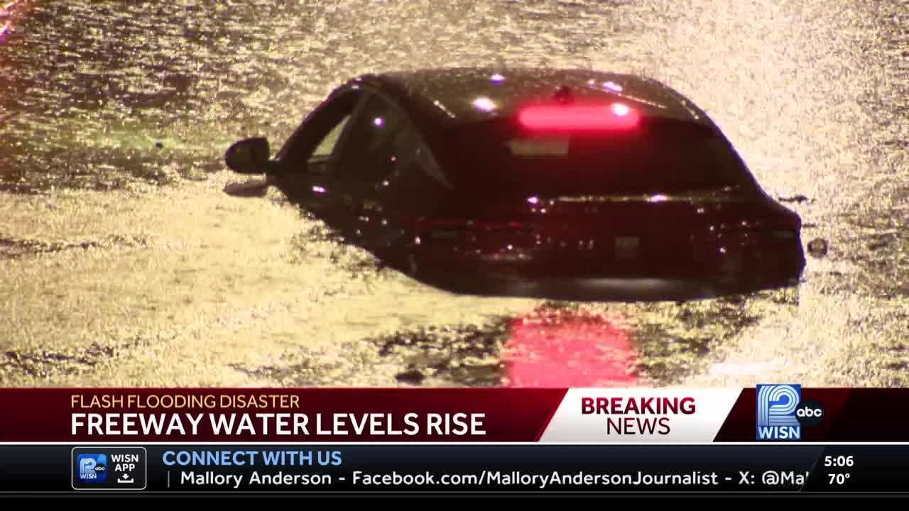 Flash flooding traps drivers on Milwaukee freeway near Brewers stadium
