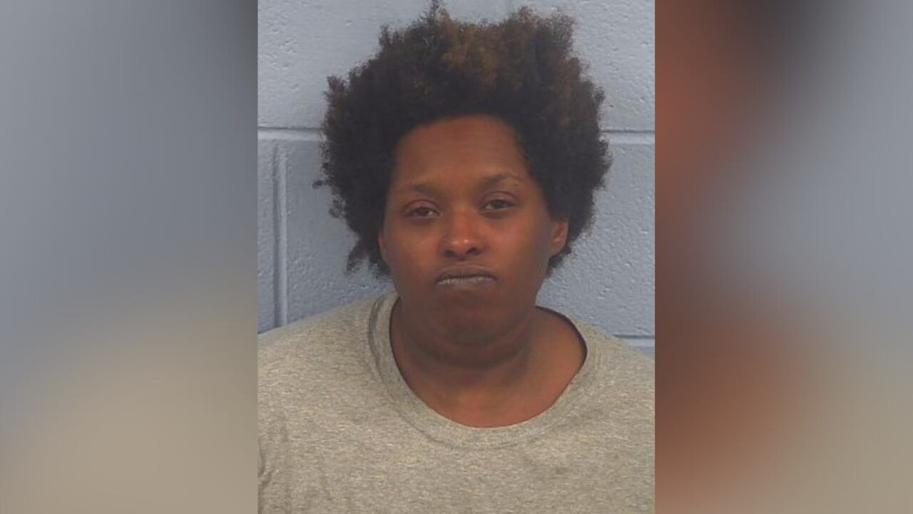 Woman arrested after dead baby girl found inside hearse at Gadsden ...