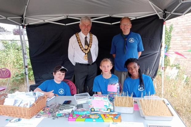 Scouts praised as Harnham fun day draws hundreds to parish field