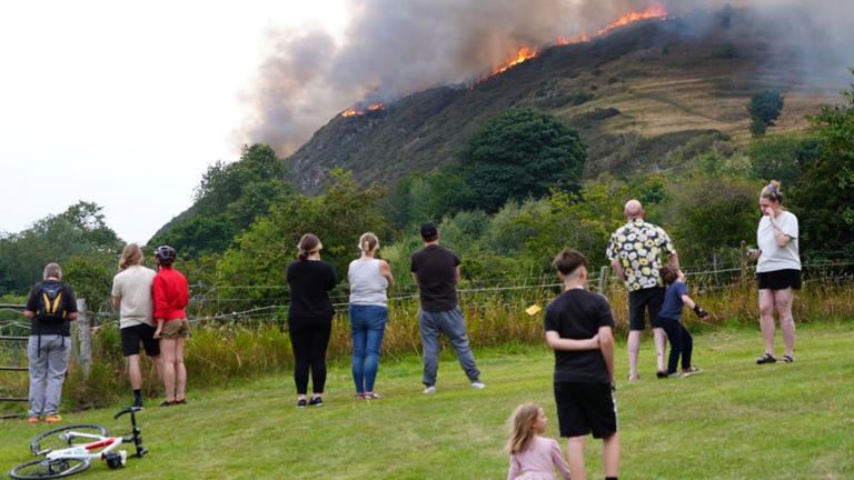 Firefighters dampen down hotspots after battling blaze at Edinburgh ...